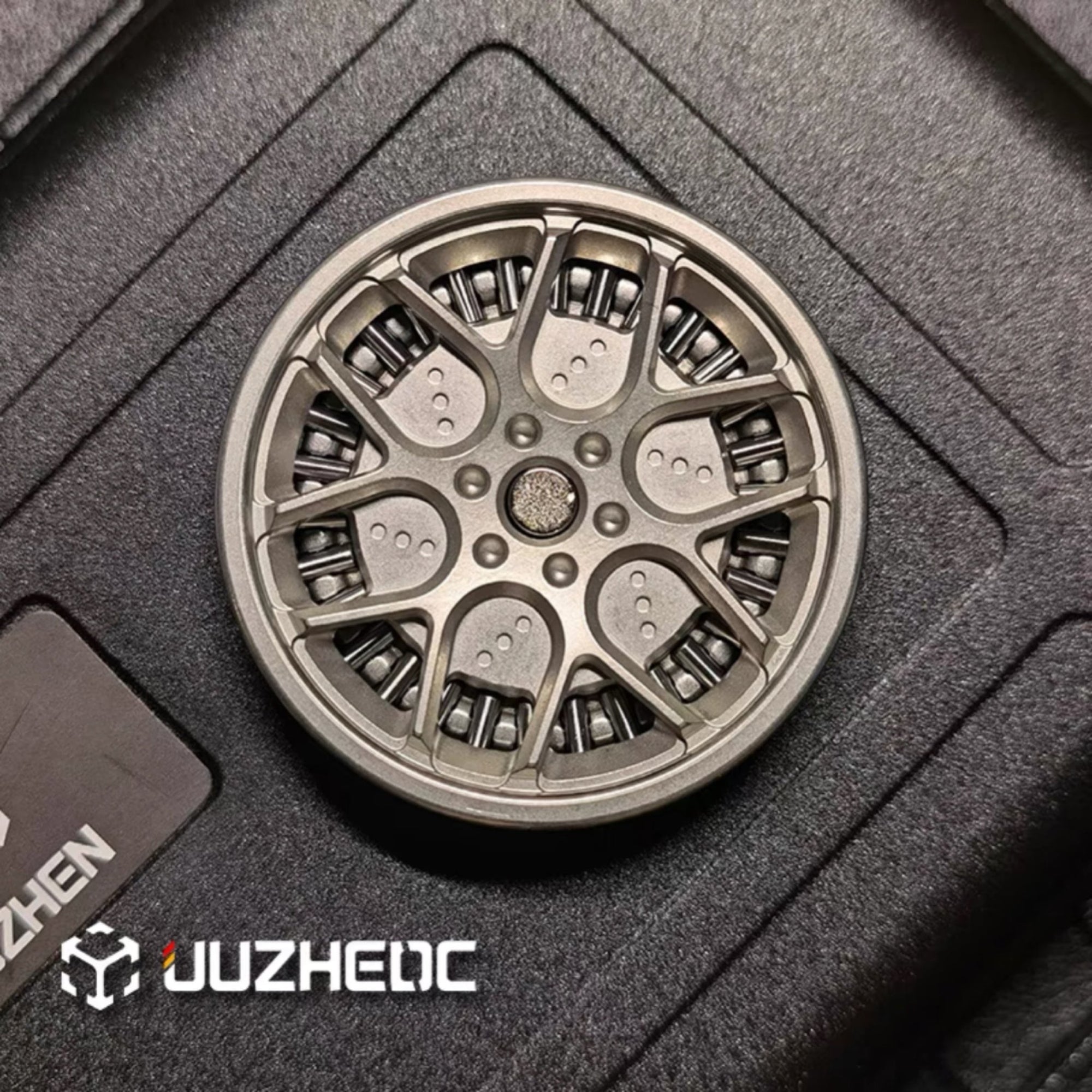 JuzhEDC Wheel Rim Haptic Coin | Fidget Toy | MetaEDC