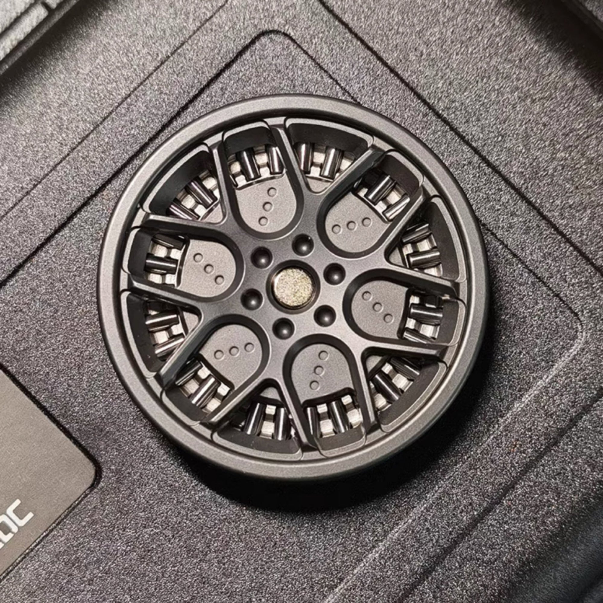 JuzhEDC Wheel Rim Haptic Coin | Fidget Toy | MetaEDC